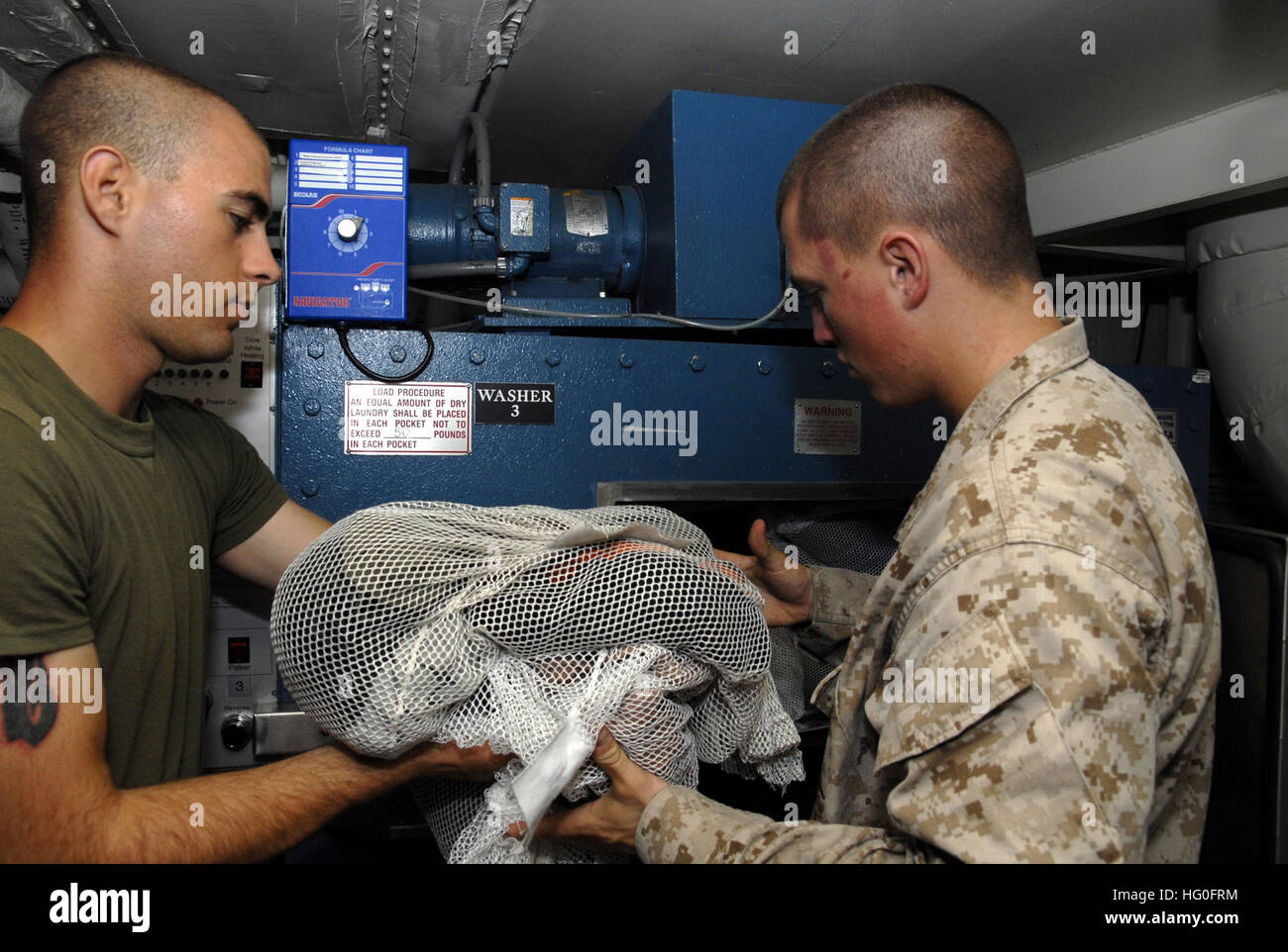 U.S. Marine Corps Lance Cpls. Skylar Bee Bee, left, and Timothy Tschida ...