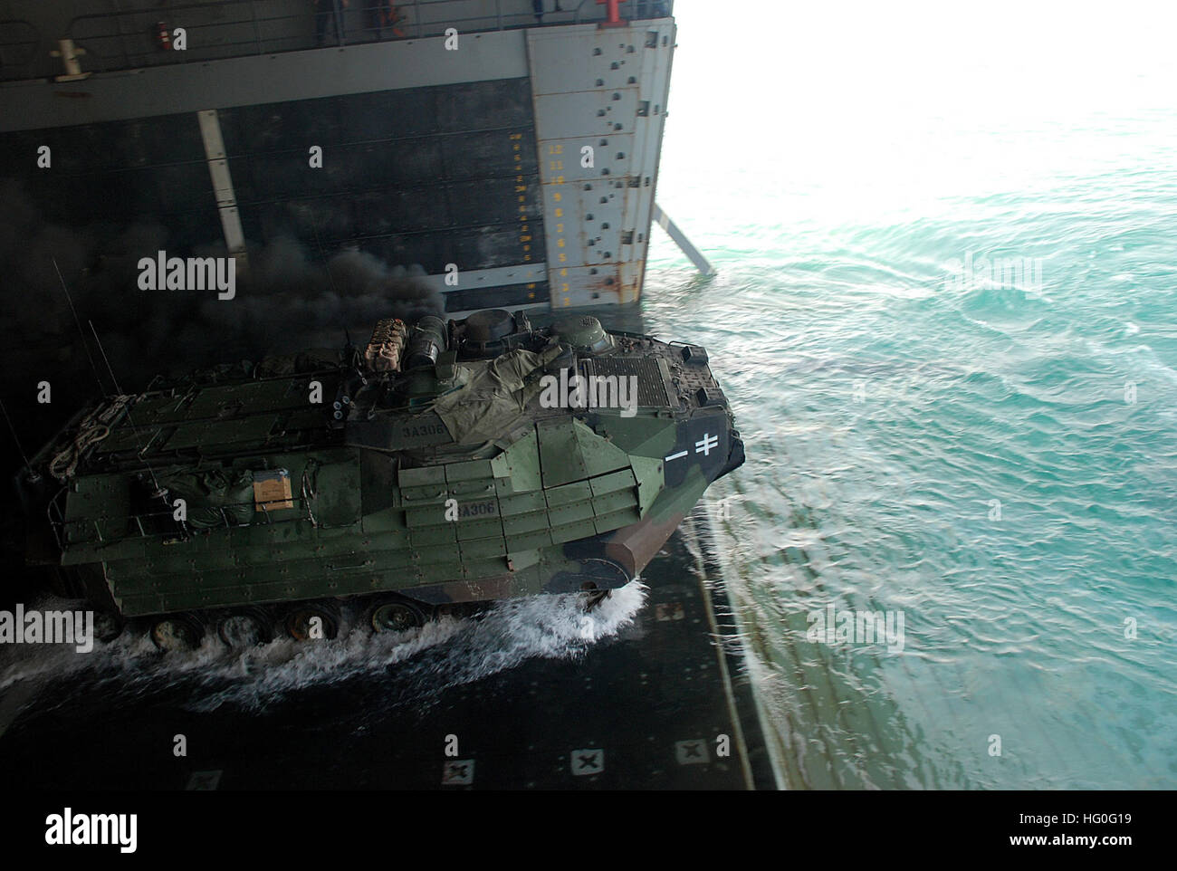 An amphibious assault vehicle (AAV) departs the amphibious transport ...