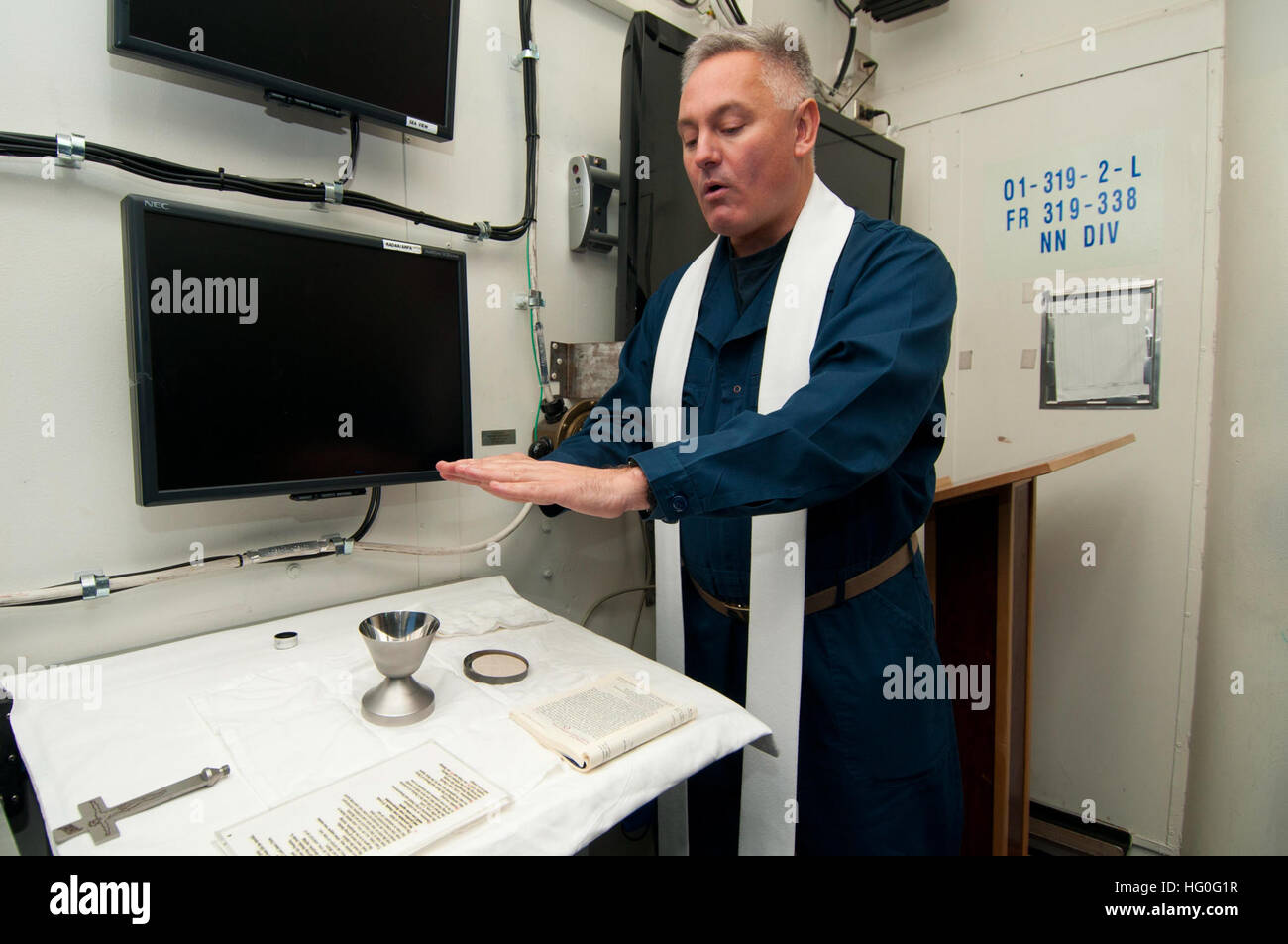 Cmdr. Daniel Mode, a chaplain assigned to Nimitz Class nuclear powered ...