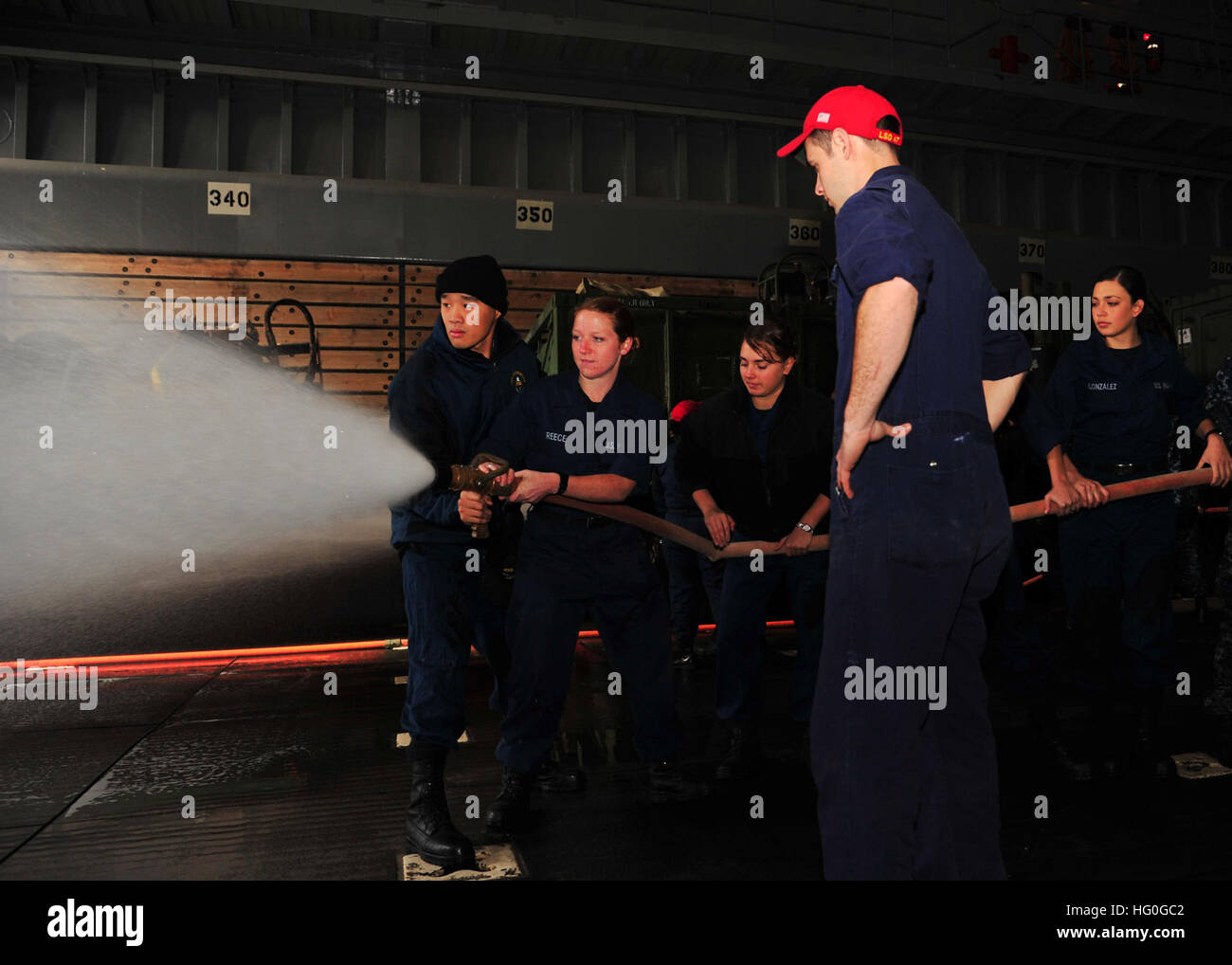 Sailors conduct basic damage control drills aboard USS Rushmore (LSD 47 ...