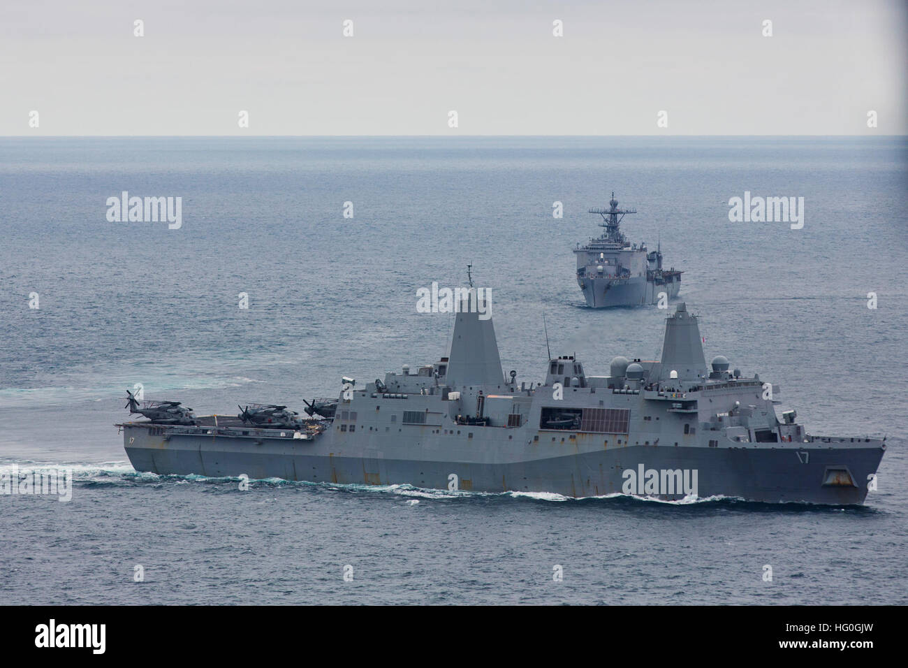 USS San Antonio (LPD 17) and USS Carter Hall (LSD 50) sail in formation ...