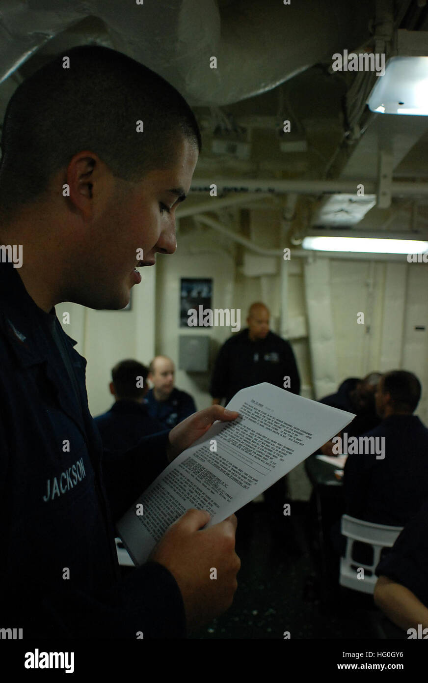 Personnel Specialist 2nd Class Derek Jackson instructs sailors taking ...