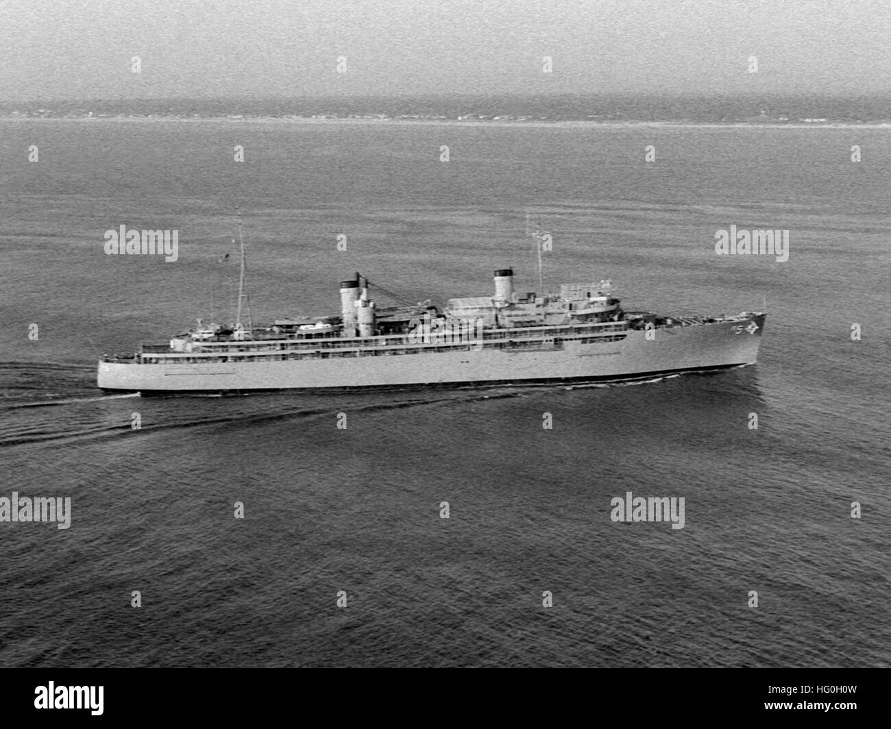 An aerial starboard view of the repair ship USS VULCAN (AR 5) underway ...