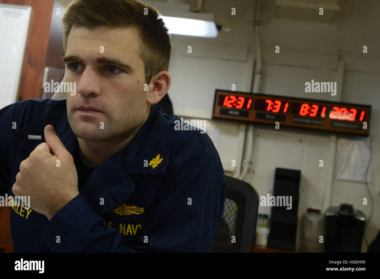 A Navy officer aboard the aircraft carrier USS George H.W. Bush ...
