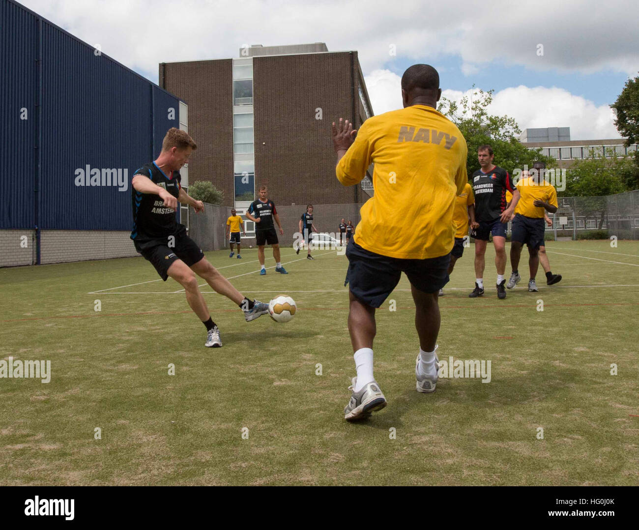 U.S. Navy Chief Logistics Specialst Osman Kamara, right, prepares to ...