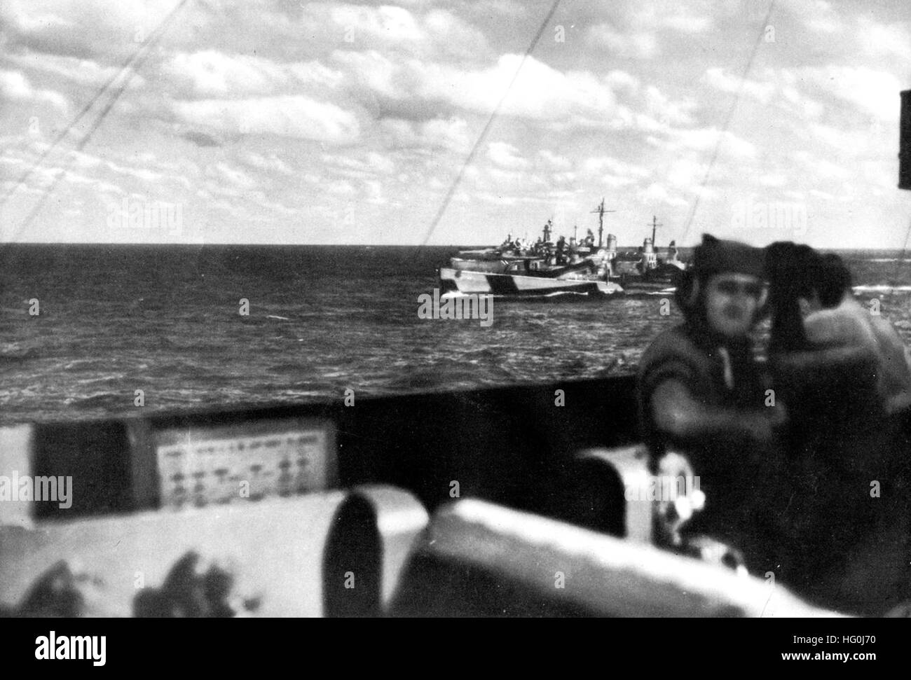 USS San Diego (CL-53) underway with battleships off Iwo Jima in ...