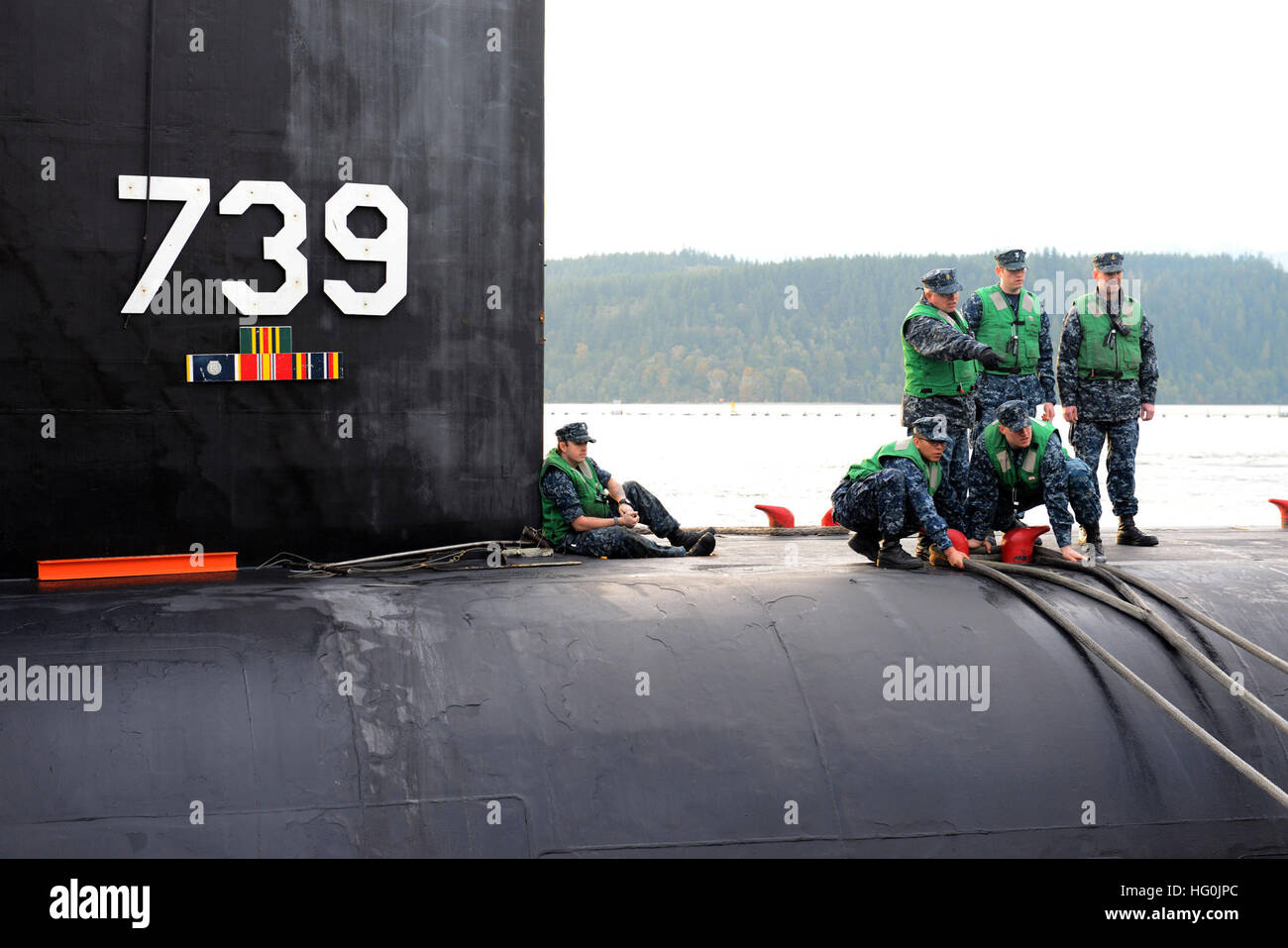 Crew members from the Gold crew of the ballistic-missile submarine USS ...