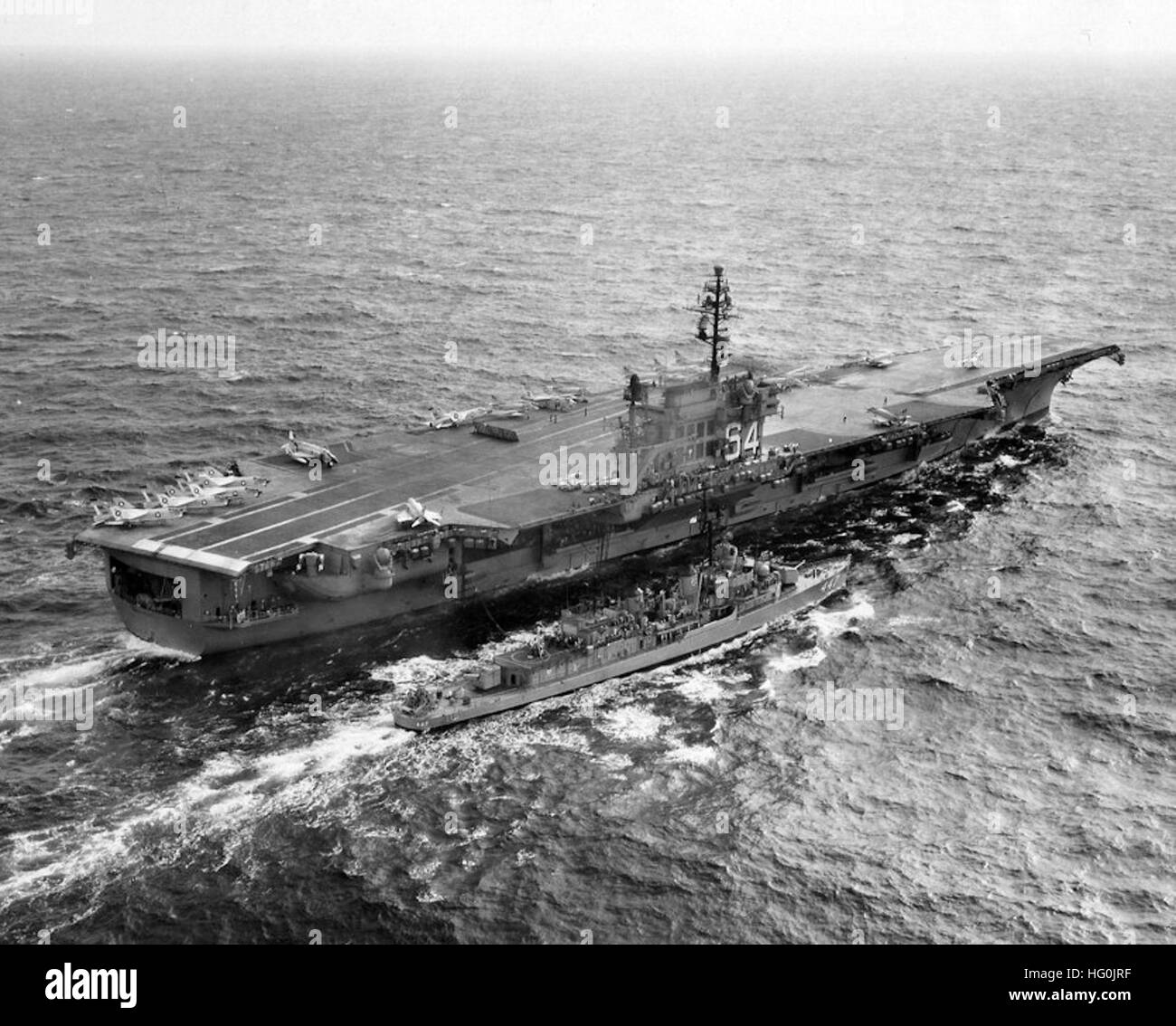 USS Constellation (CVA-64) refueling USS Jenkins (DD-447) c1962 Stock ...