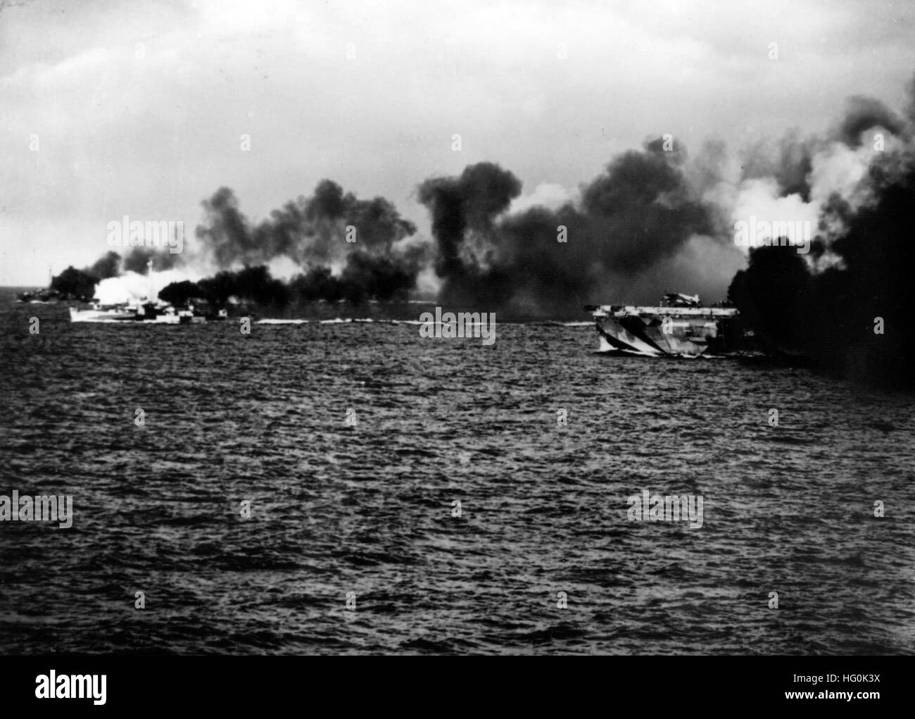 USS Gambier Bay (CVE-73) and escorts making smoke off Samar 1944 Stock ...