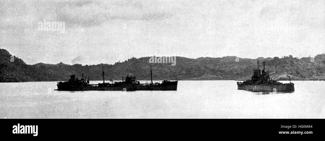 USS Columbia (CL-56), a Cleveland-class light cruiser, alongside a ...