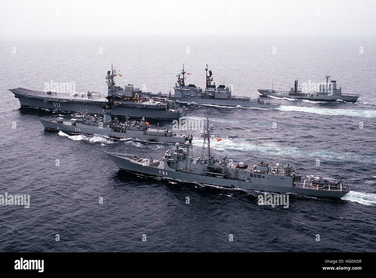 USS Scott (DDG‑995), a Kidd-class destroyer, is shown alongside Spanish ...