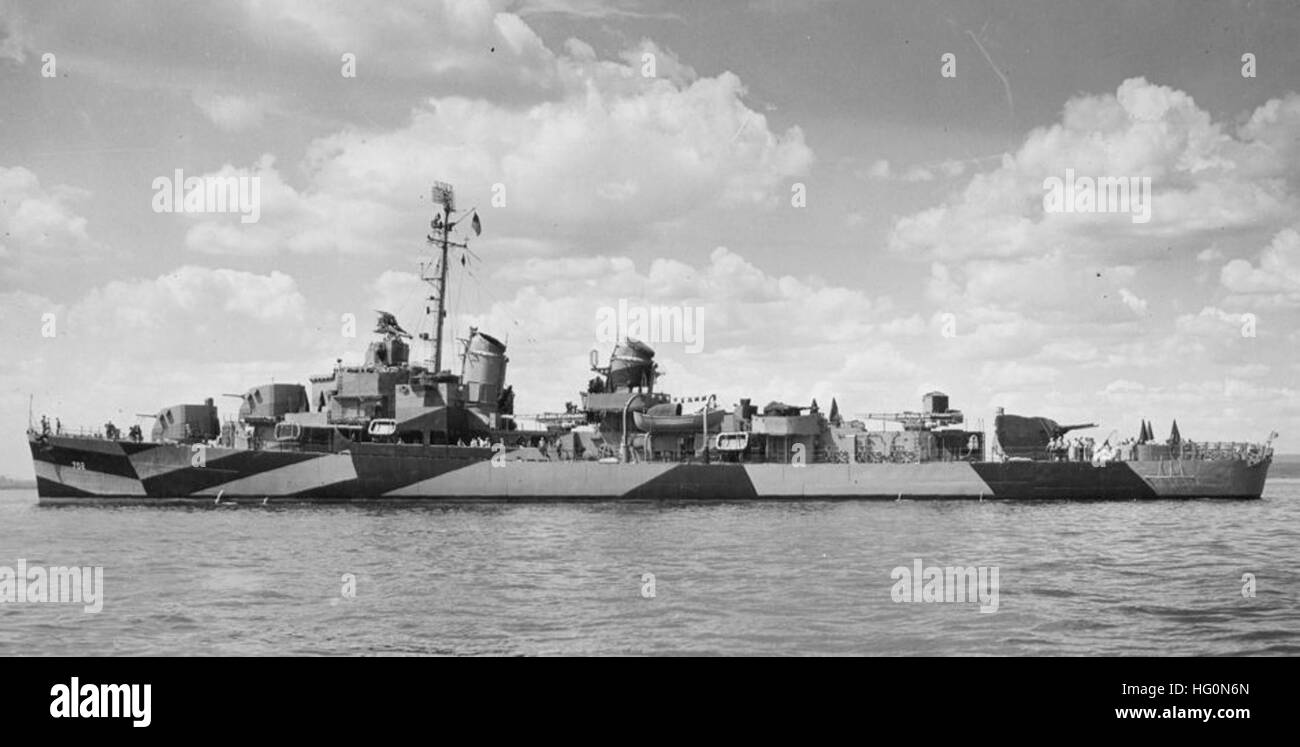 USS Hank (DD-702), an Allen M. Sumner-class destroyer, participates in ...