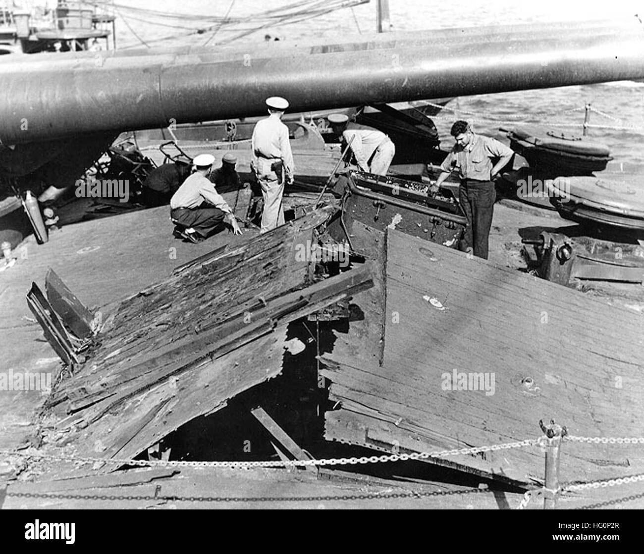 USS Nevada damage to forecastle deck due to bomb blast' Stock Photo - Alamy