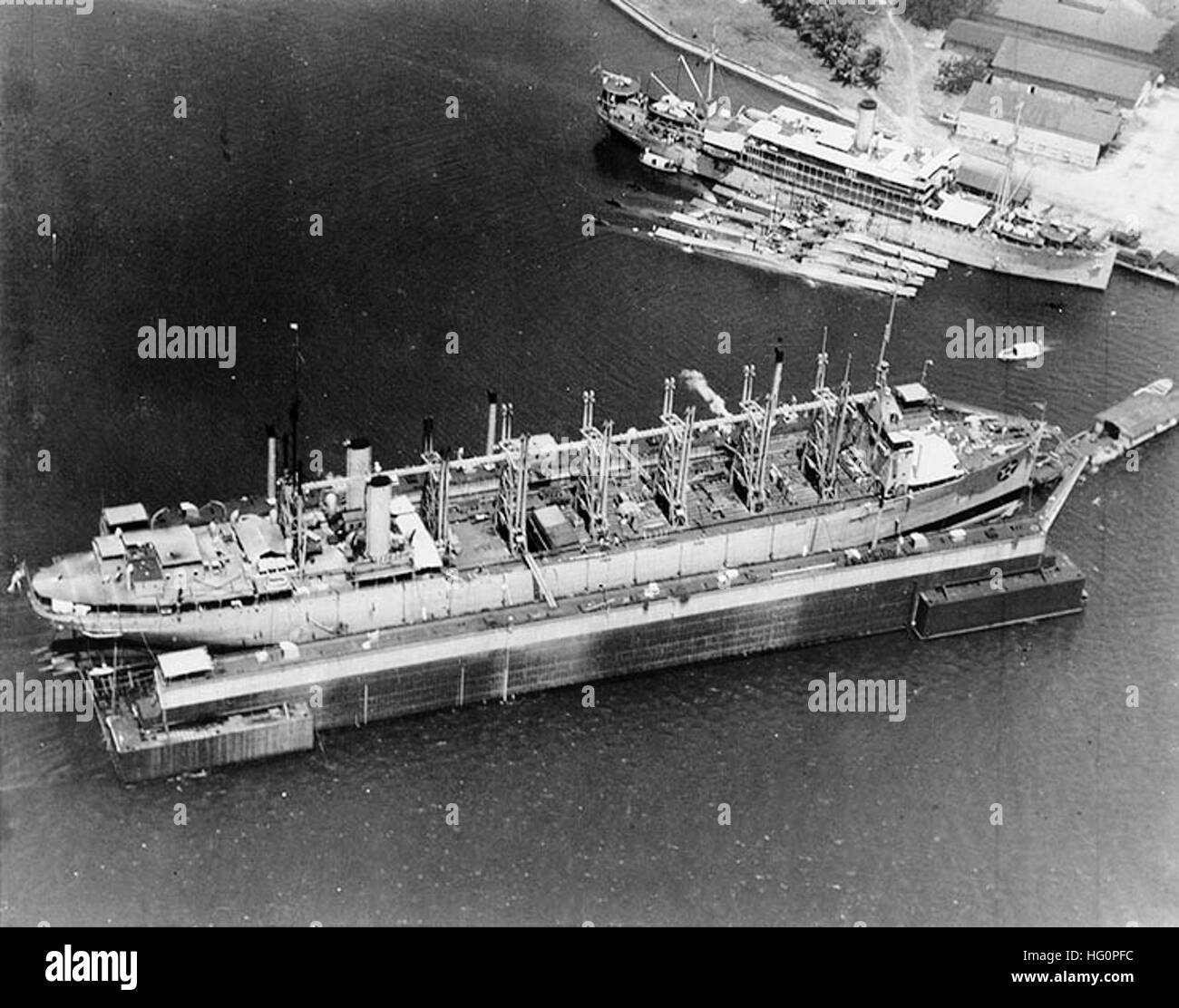 USS Jason (AV-2) in Drydock Dewey, aerial view Stock Photo - Alamy