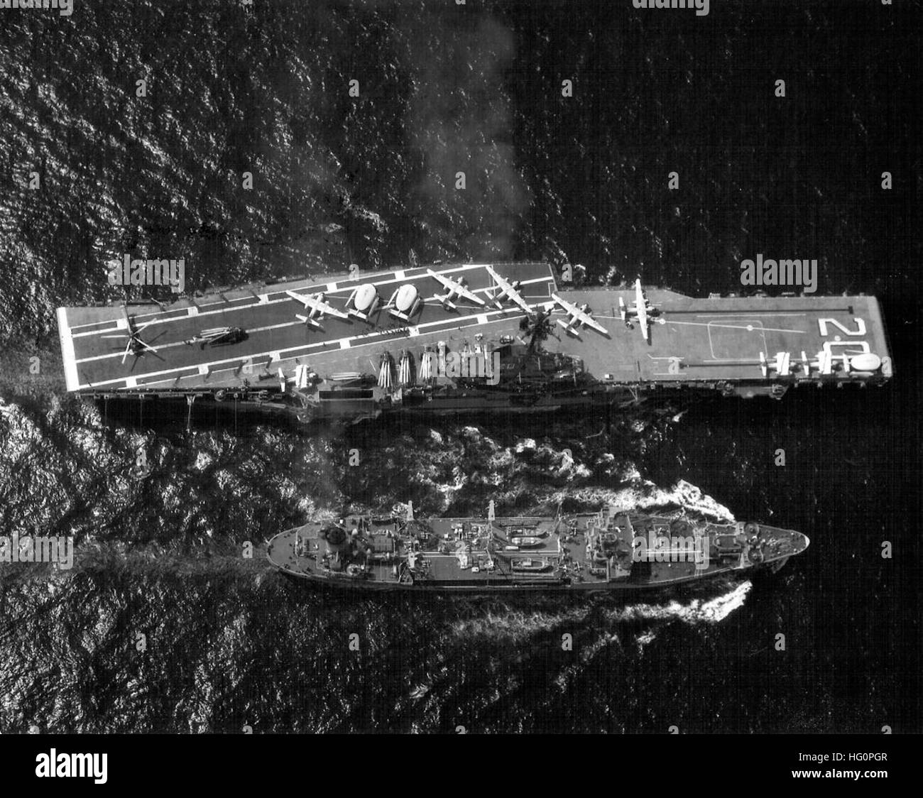 USS Tolovana (AO-64) refueling USS Bennington (CVS-20) 1966 Stock Photo ...