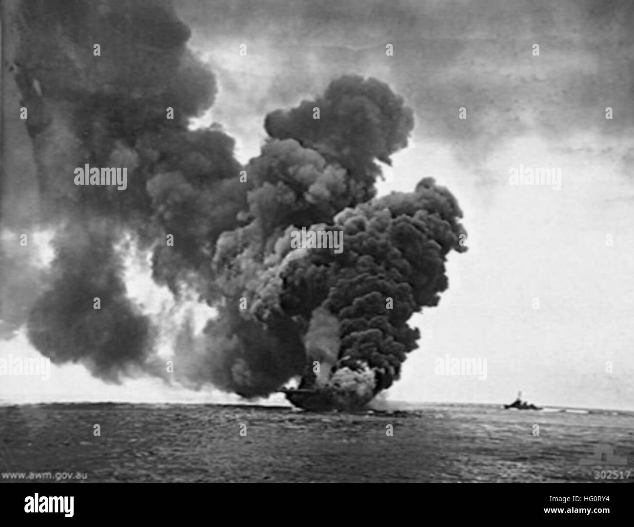 USS Bunker HIll (CV-17) burning with destroyer 1945 Stock Photo - Alamy