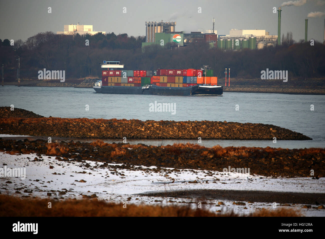 Cologne, Germany. 03rd Jan, 2017. Weather. A container ship sailing on ...