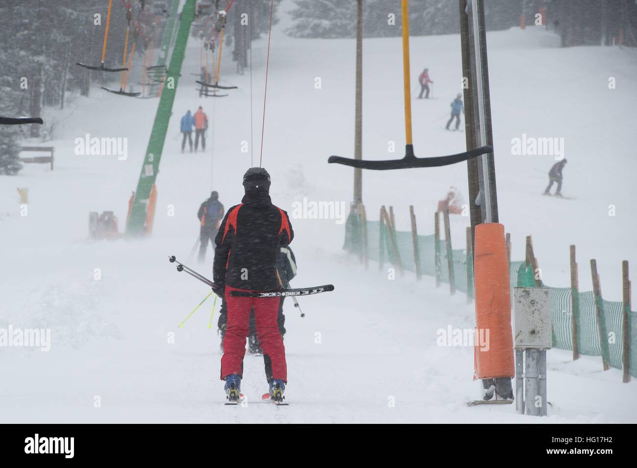 Altenberg, Germany. 04th Jan, 2017. Skiiers use a T-bar lift in ...