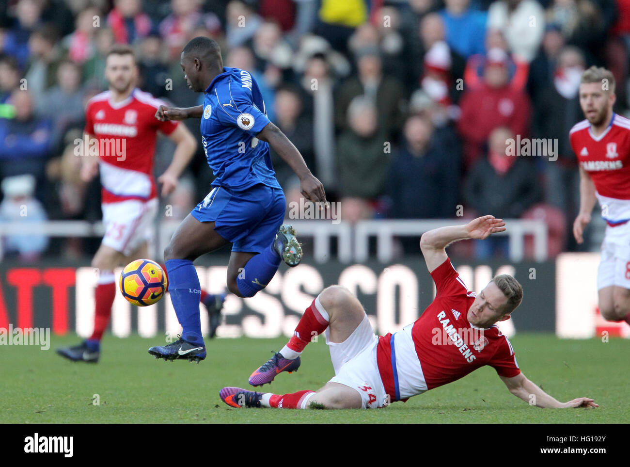 Leicester City's Nampalys Mendy (left) and Middlesbrough's Adam Forshaw (right) battle for the ...