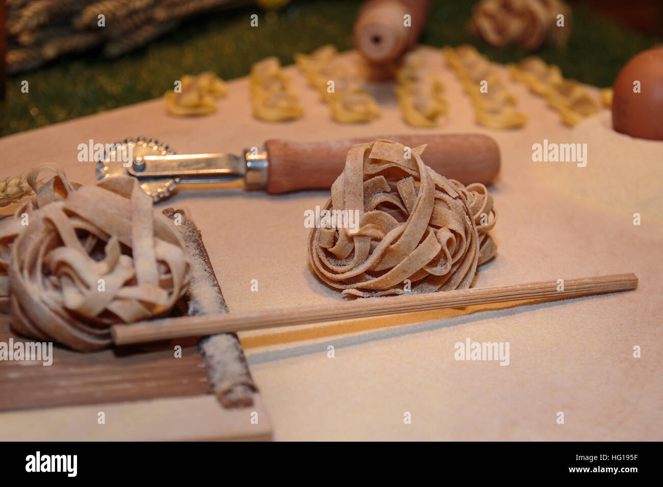 Tagliatelle and Tortellini Italian Pasta with Flour and Pastry Cutter ...