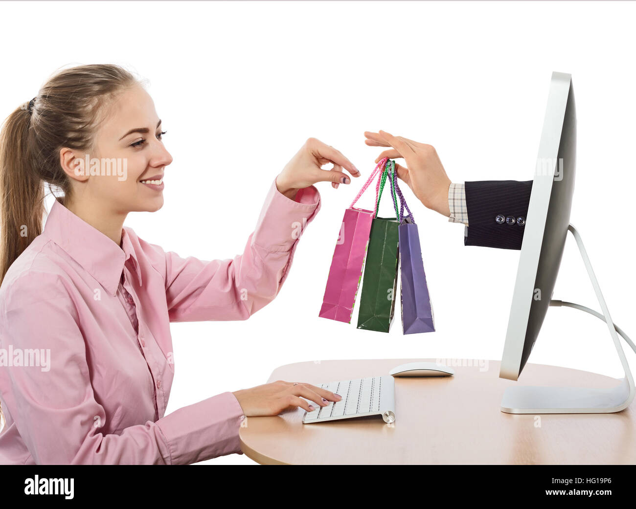 Young Woman makes Order on Computer and gets Delivery Stock Photo - Alamy