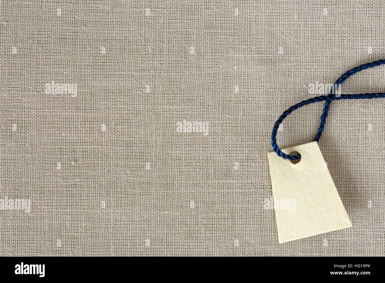 Light grey Fabric Background and blank Price Tag Stock Photo - Alamy