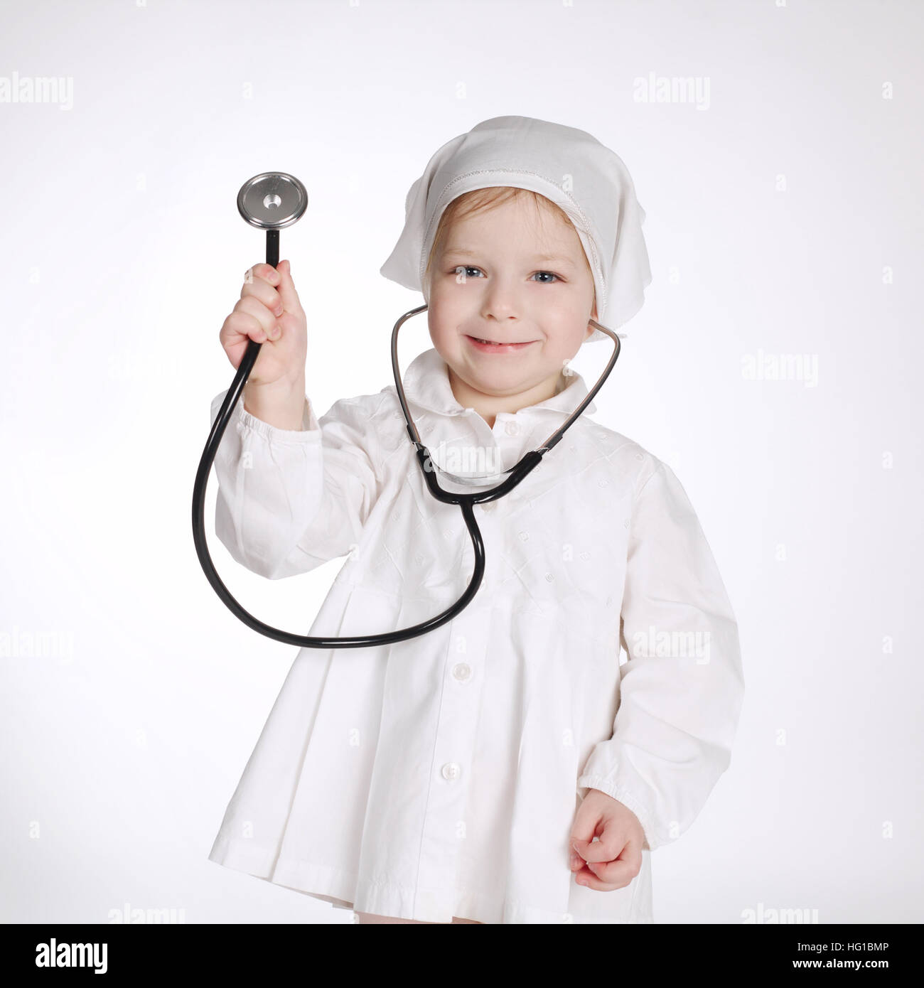 cute little girl playing doctor Stock Photo - Alamy