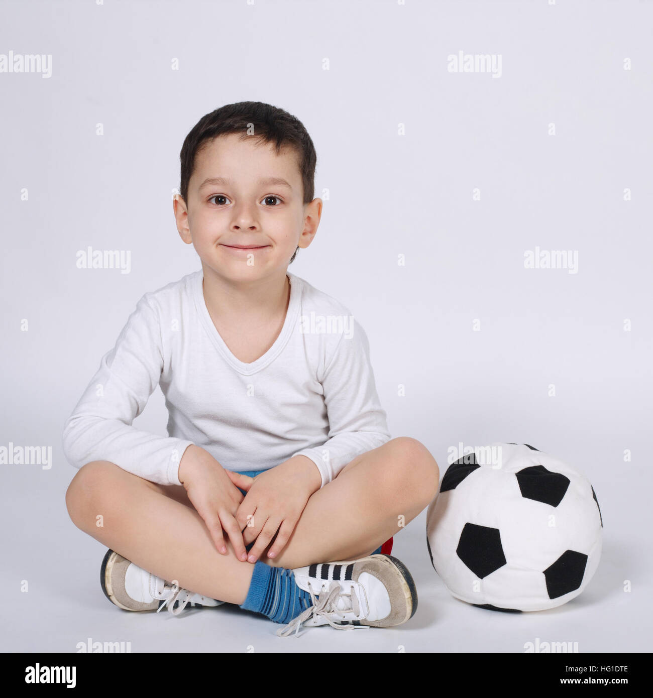 little football player on white background Stock Photo - Alamy