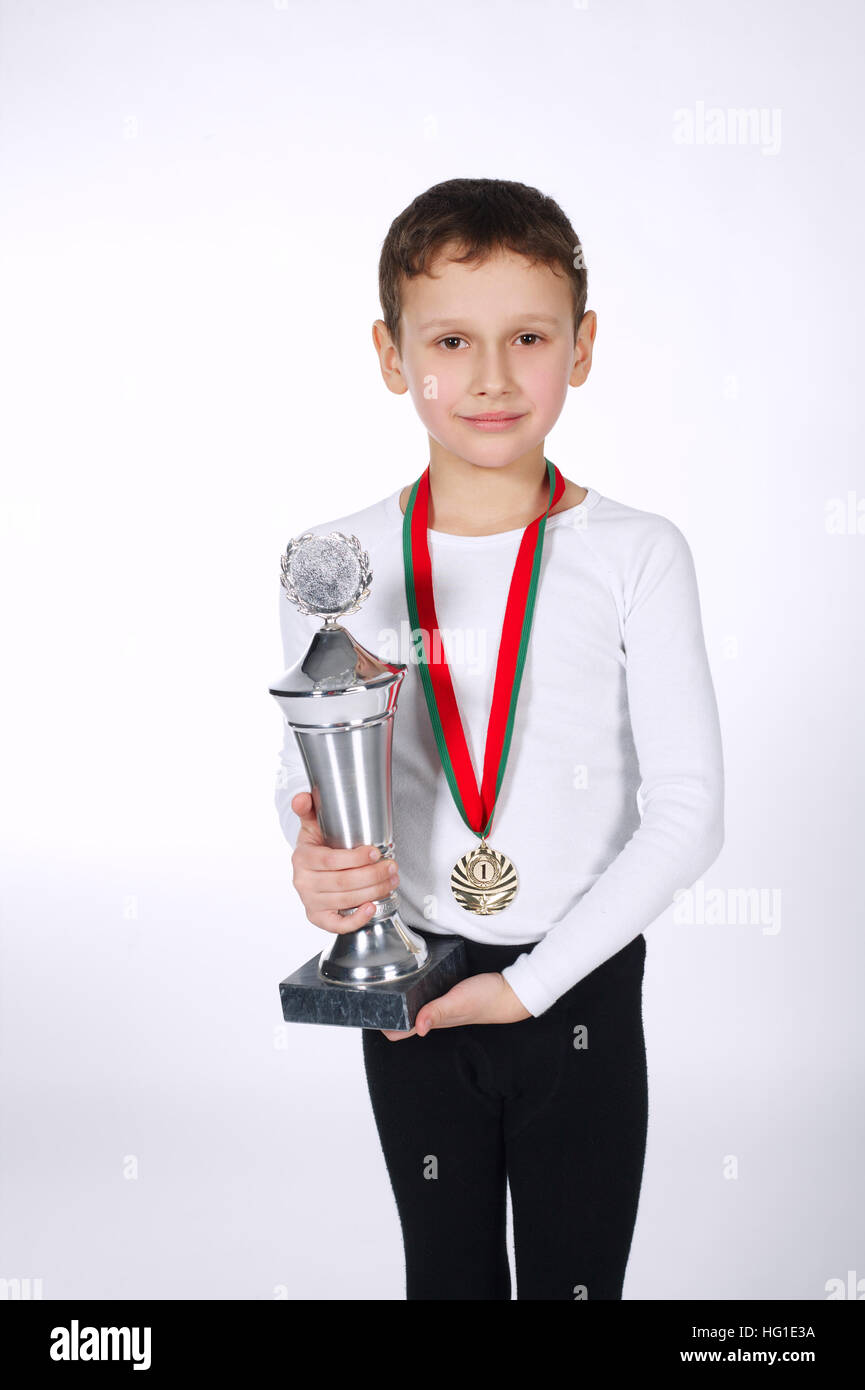 young winner on white background Stock Photo - Alamy