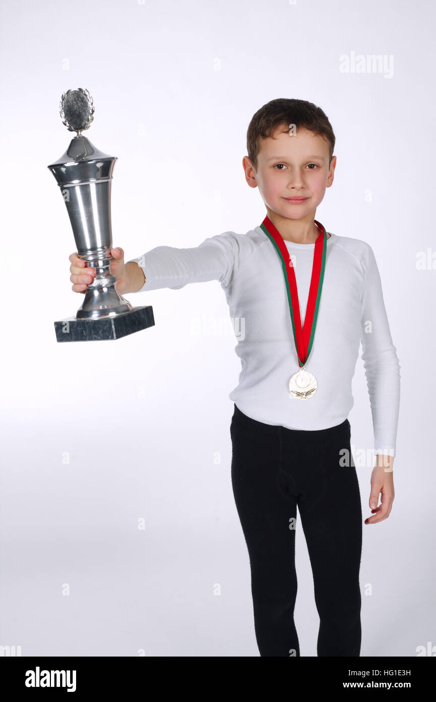 young winner on white background Stock Photo - Alamy