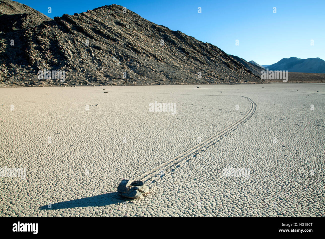 Rock and track, The Racetrack, Death Valley National Park, California ...