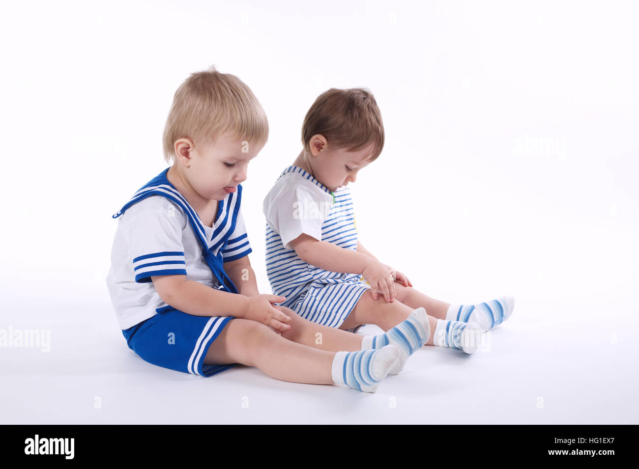 two boys isolated on white Stock Photo - Alamy