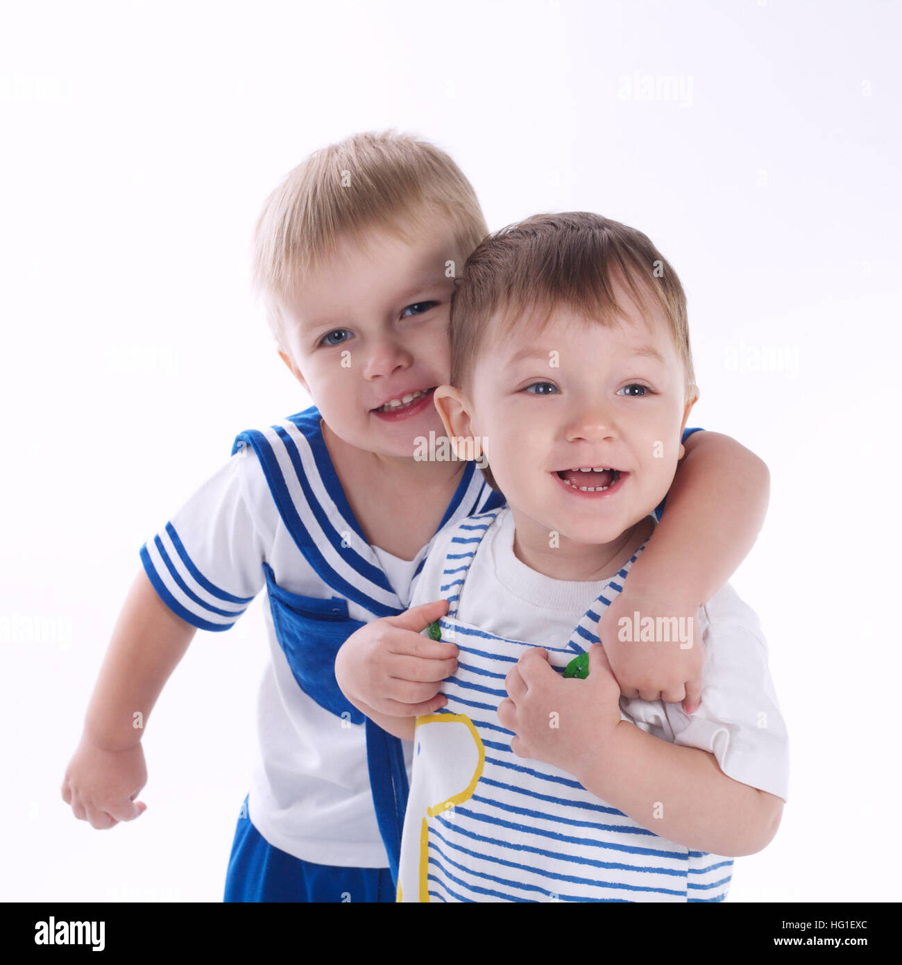 two boys isolated on white Stock Photo - Alamy