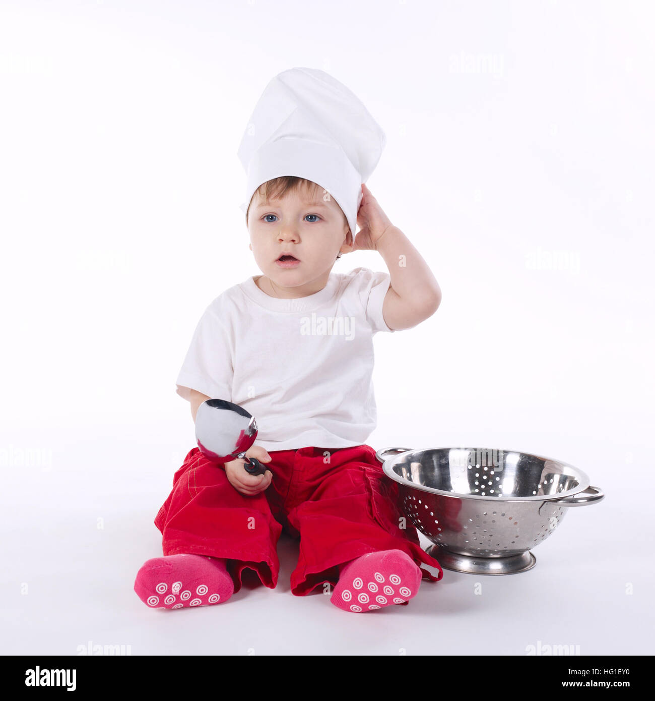 little cook on white background Stock Photo - Alamy