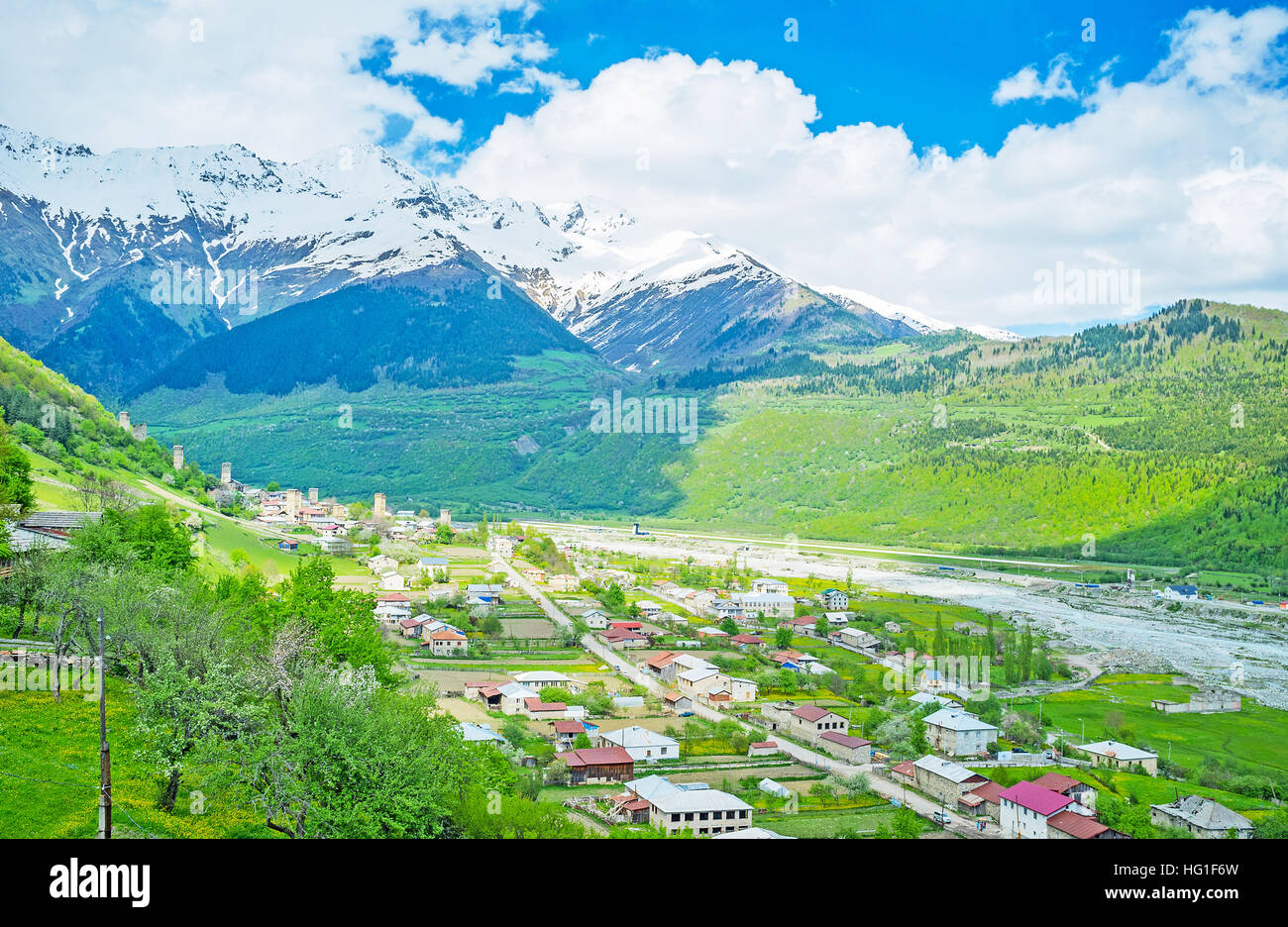 The view on the wide winding valley of Mestiachala river with the snowy ...