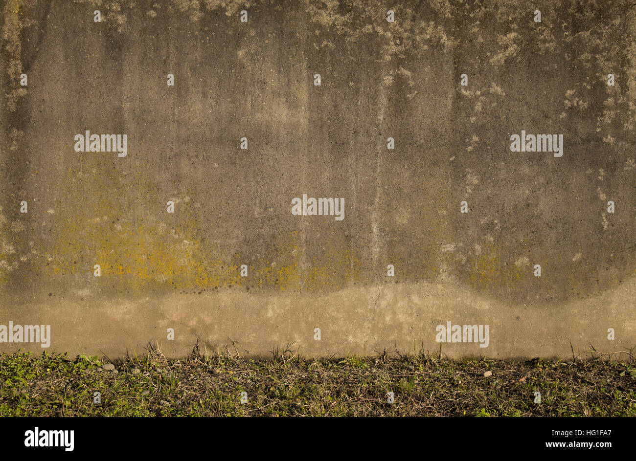 Stone wall with ground Stock Photo - Alamy
