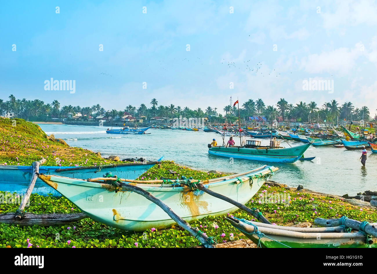 The fishing harbor is the noisy crowded place with old boats, departing ...