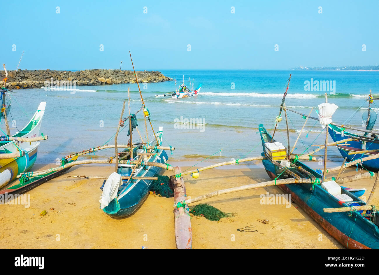 The fishing port is full of traditional catamaran-boats Stock Photo - Alamy