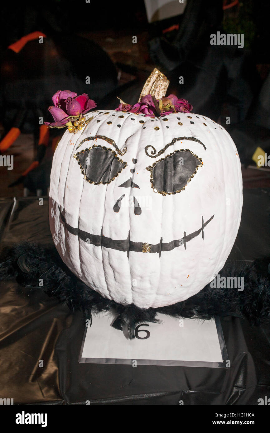 A funny face entry in a Halloween pumpkin decorating contest in ...