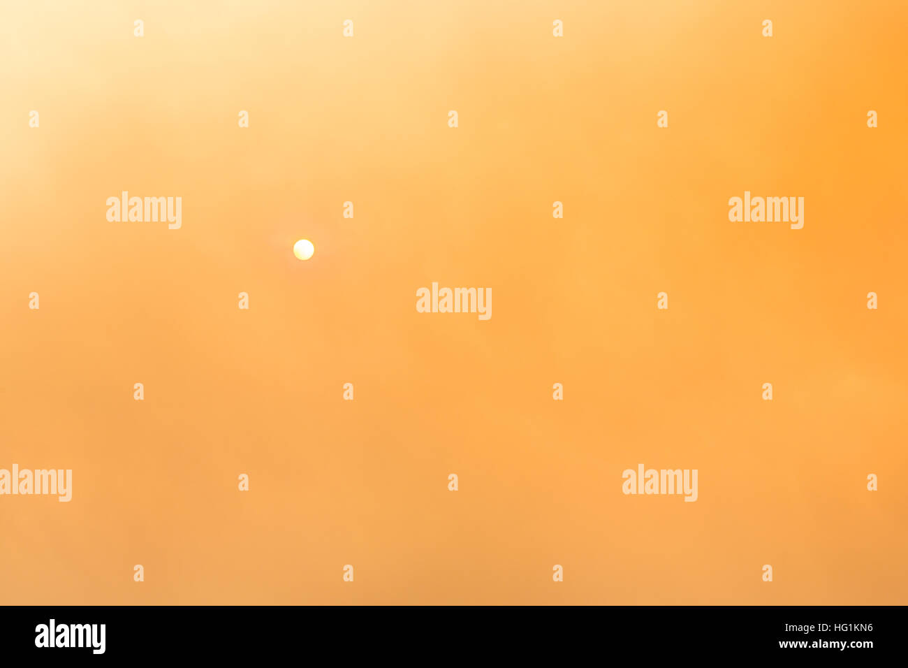 The sun glows red during a forest fire Stock Photo - Alamy