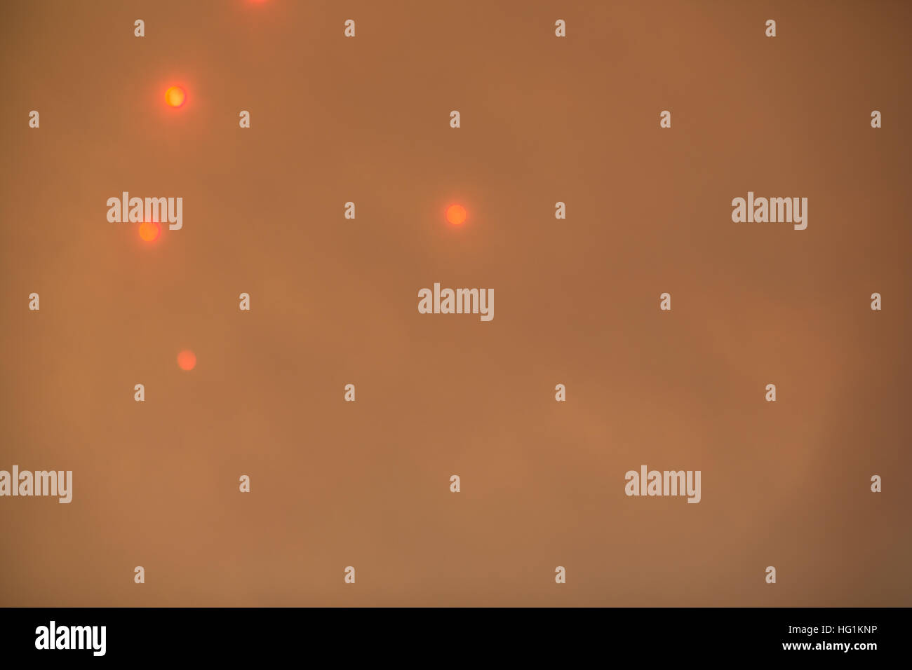 The sun glows red during a forest fire (prism Stock Photo - Alamy
