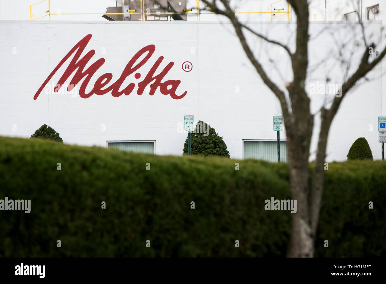 A logo sign outside of a facility occupied by Melitta USA in Cherry ...