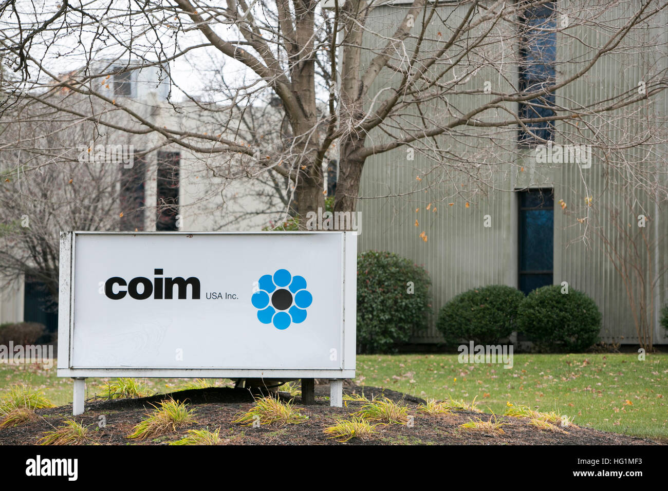 A logo sign outside of a facility occupied by Coim USA, Inc., in West ...