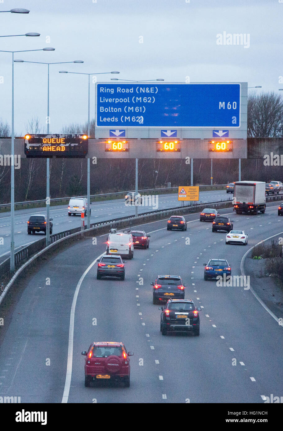 Busy traffic on the M60 motorway in Manchester near Sale Stock Photo ...