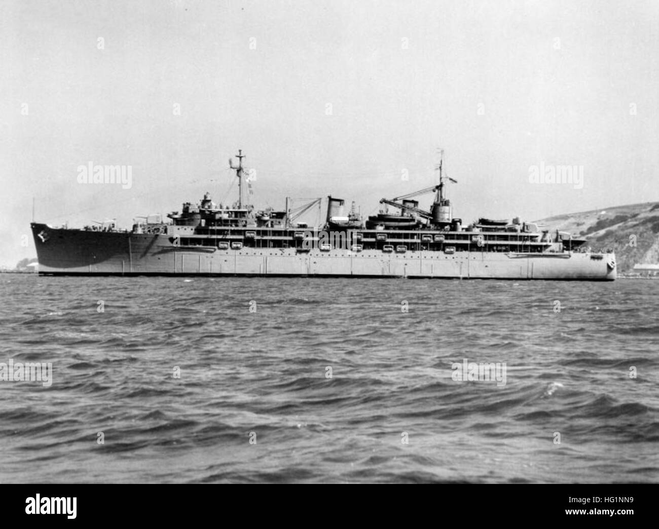 USS Bushnell (AS-15), a submarine tender, provides maintenance, repair ...