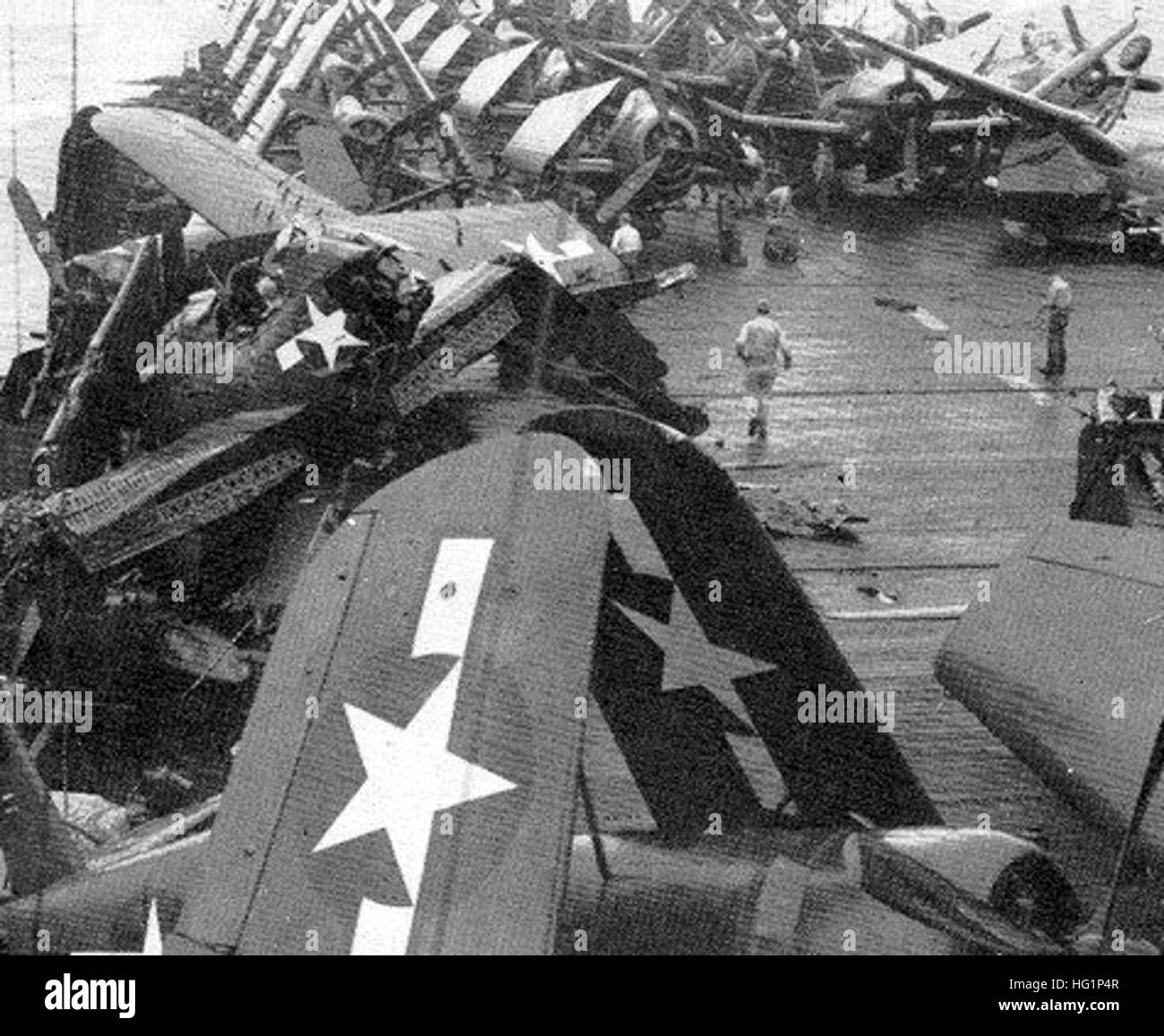Wrecked aircraft on USS Attu (CVE-102) after typhoon in June 1945 Stock ...