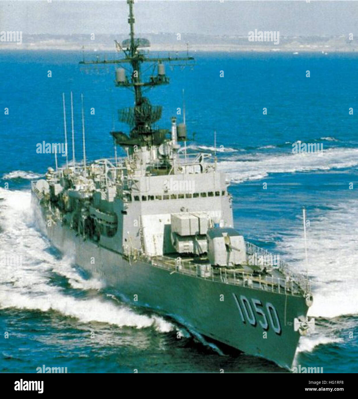 USS Albert David (FF-1050), a frigate, is depicted performing fleet ...