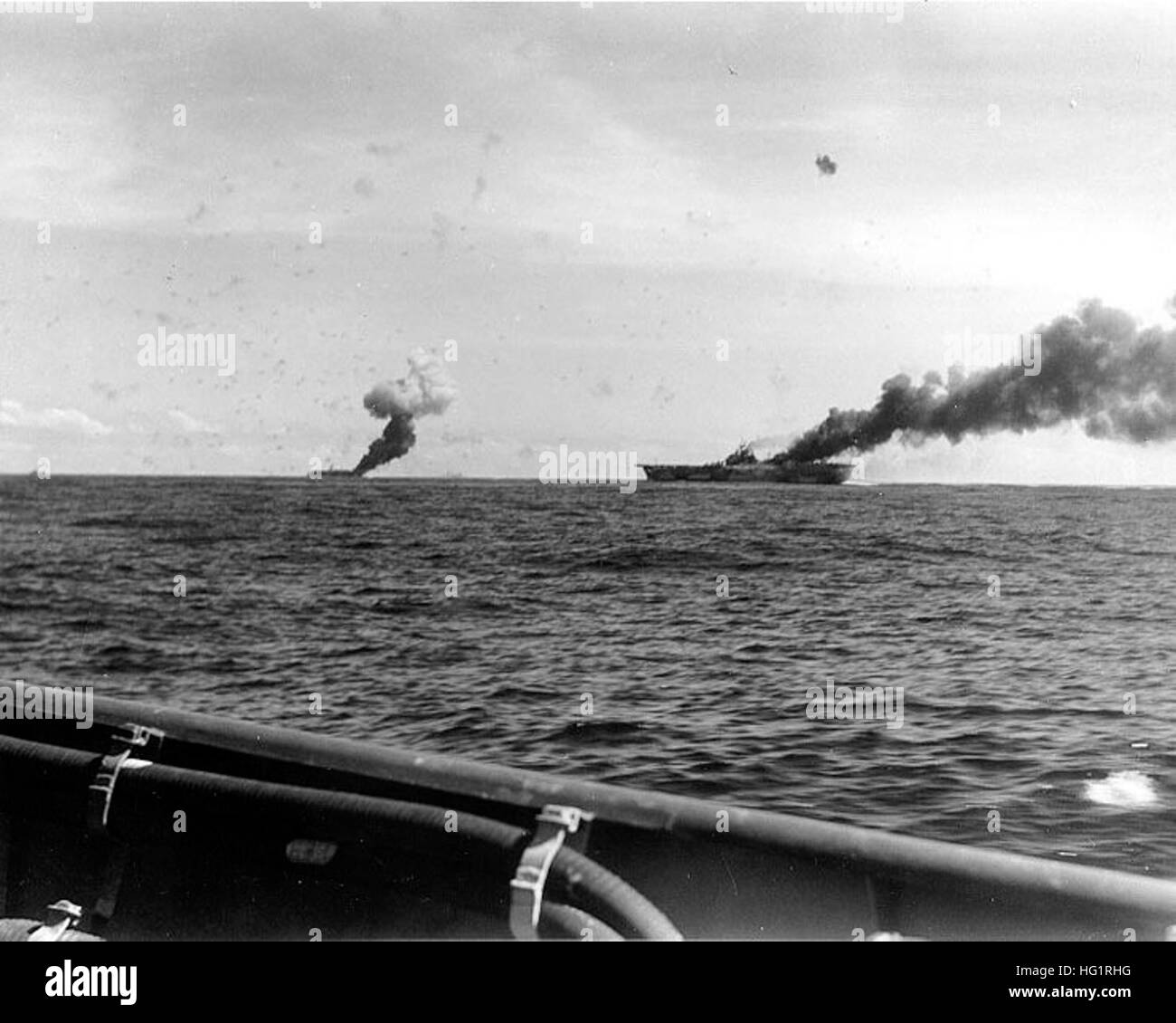 USS Franklin (CV-13) and USS Belleau Wood (CVL-24) afire 1944 Stock ...