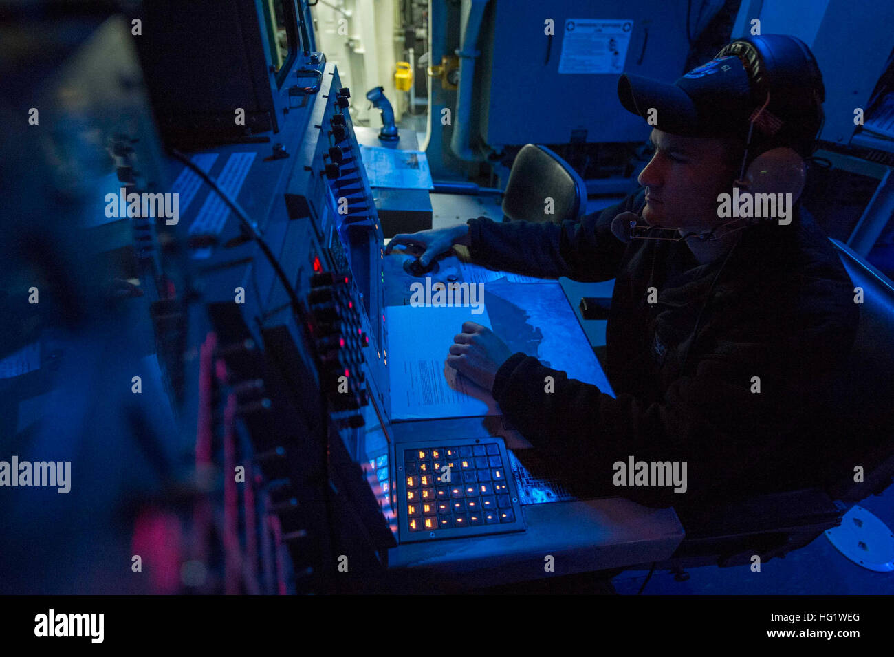 U.S. Navy Fire Controlman 3rd Class Kyle Condon monitors radar ...