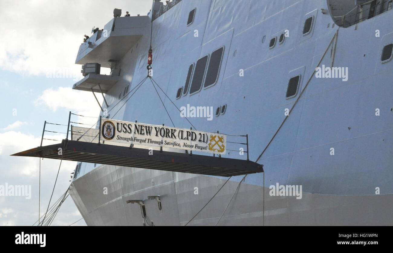 The brow of the amphibious transport dock ship USS New York (LPD 21) is ...